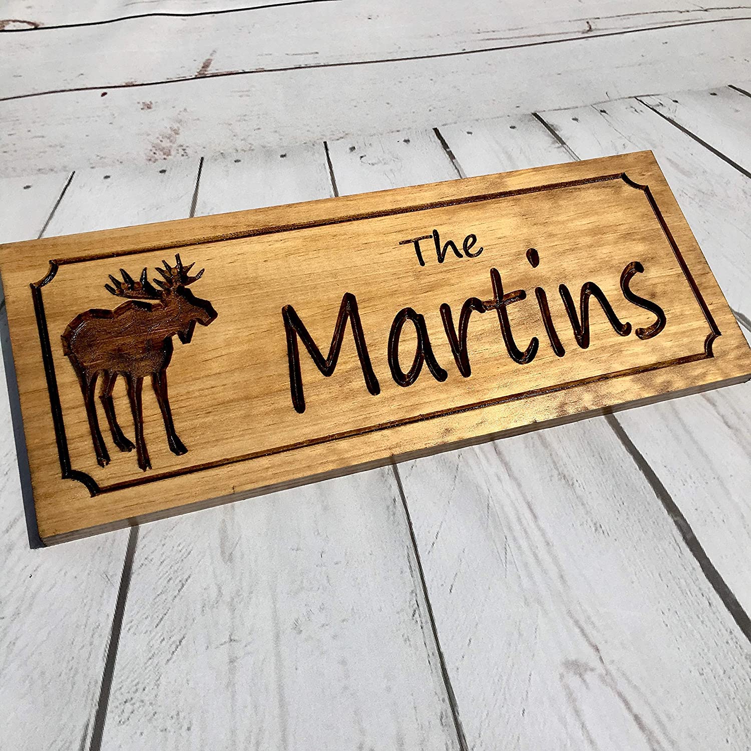 Wooden Carved Cabin Sign with Moose: benchmarksignsandgifts.com