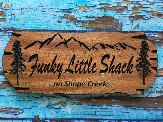 Personalized Wood Sign with Mountains and Trees: benchmarksignsandgifts.com